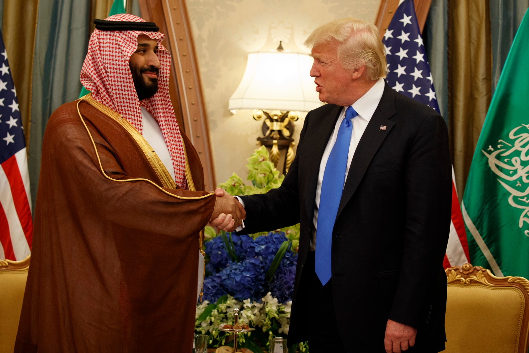 Saudis welcome Trump with gold medal, receive arms package